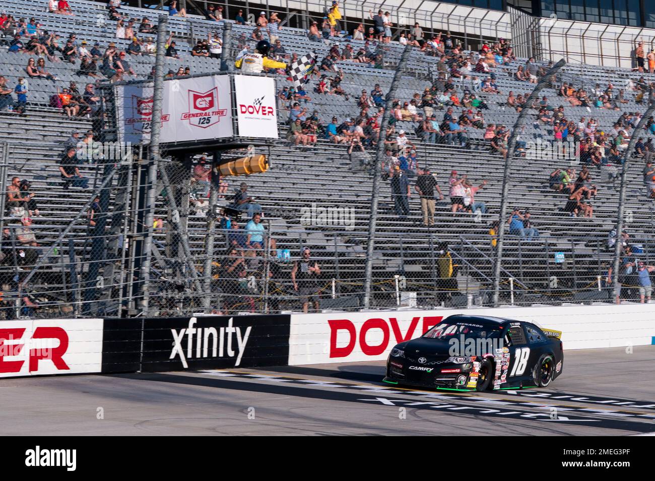 Ty Gibbs gets the checkered flag as he crosses the finish line during ...