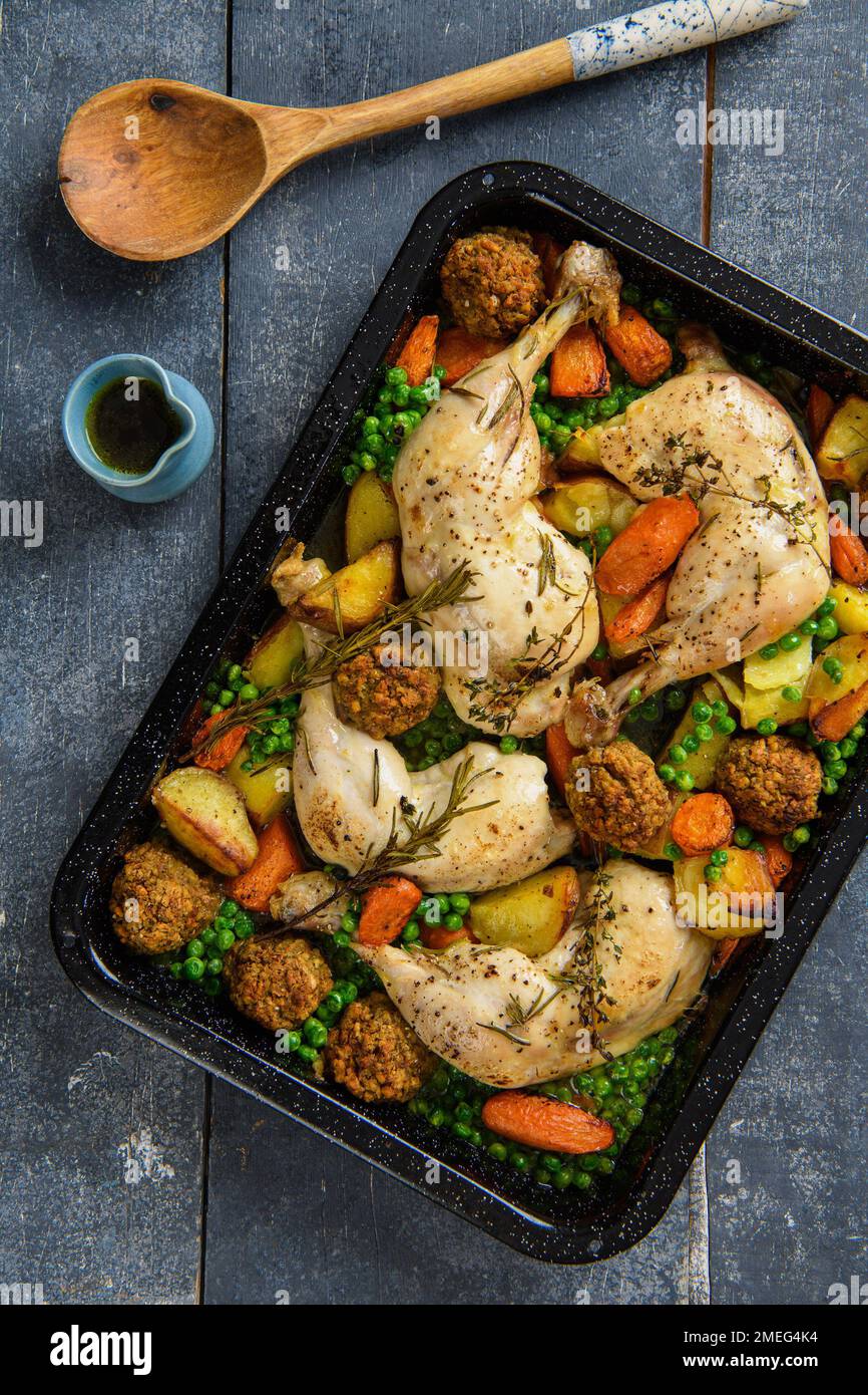 EDITORIAL USE ONLY A traybake Sunday roast made by Television presenter ...