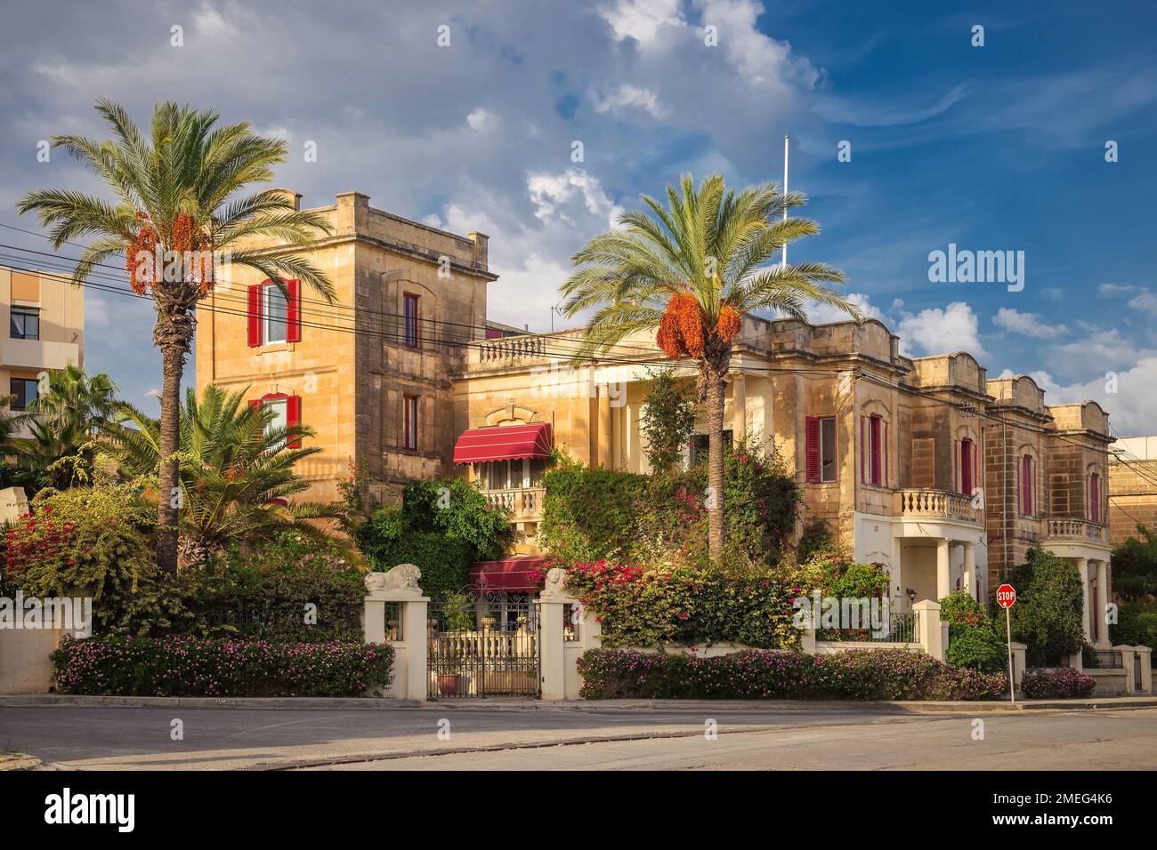 Sliema, Malta - Traditional Maltese nice house with palm trees and blue ...
