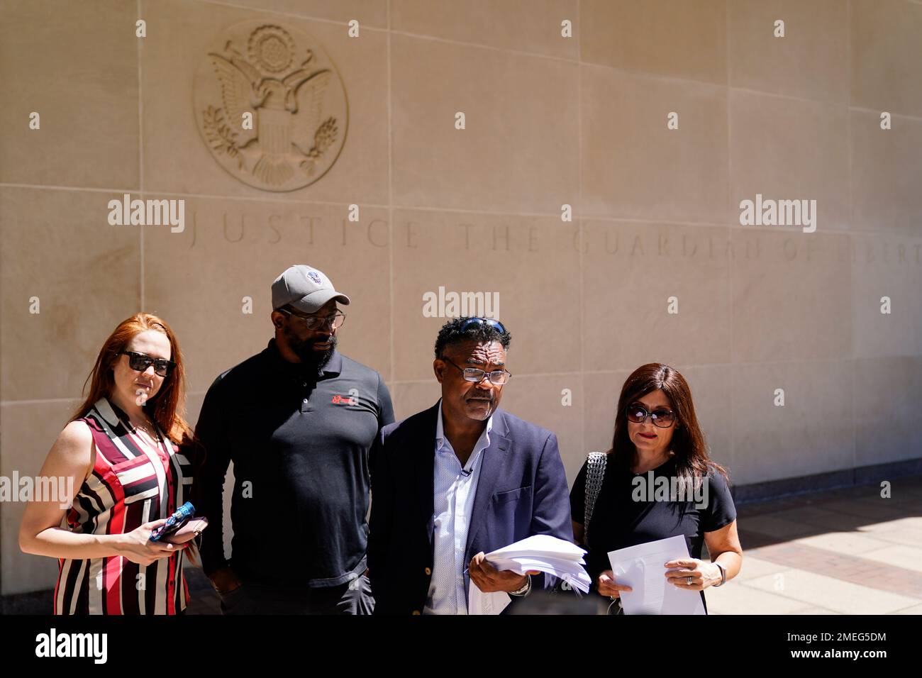 From the left, Brooke Vaughn, her husband former NFL player Clarence ...