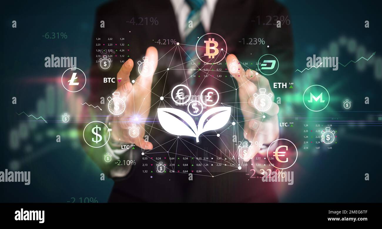 Businessman holding currency symbols concept Stock Photo - Alamy