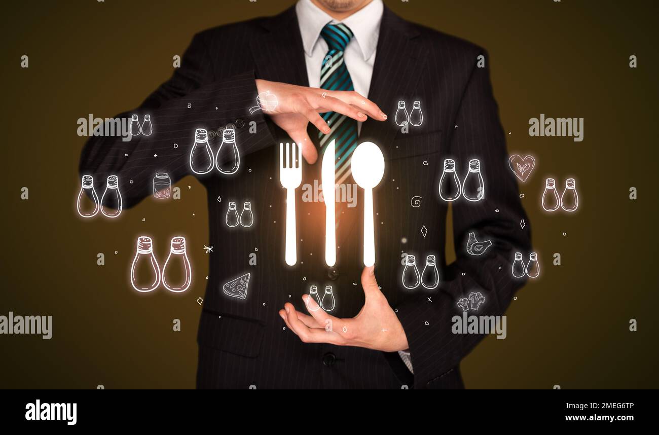 Hand holding food related icons Stock Photo - Alamy