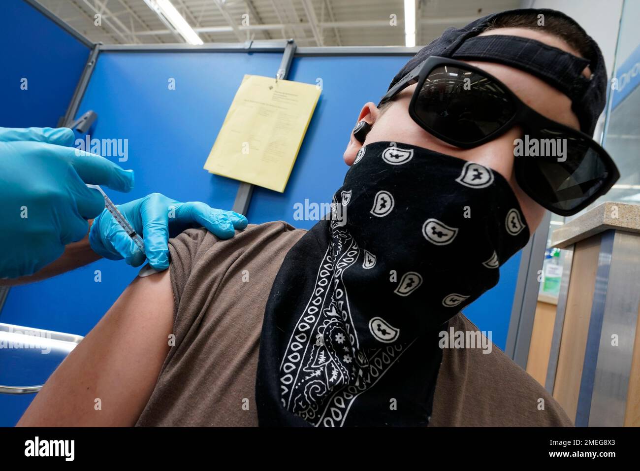 Fourteen-year-old Jackson Roop, of Powhatan, Va., gets his first dose ...
