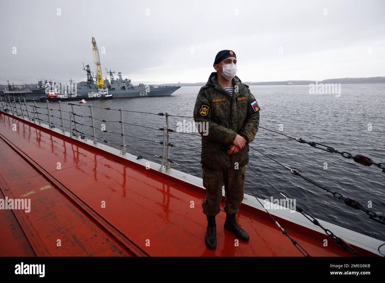 A Russian sailor stands guard on board of the Northern Fleet's flagship ...