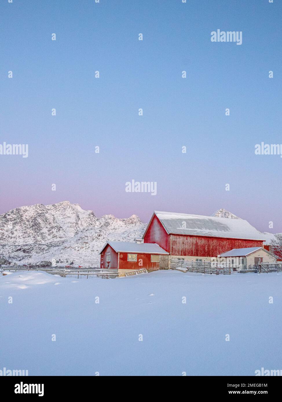 Snowy winter pastel color landscape with red barn houses in Lofoten ...