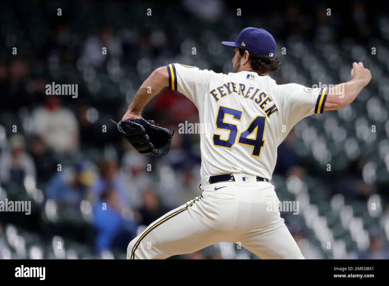 Milwaukee Brewers' J.P. Feyereisen pitches during the tenth inning of a ...