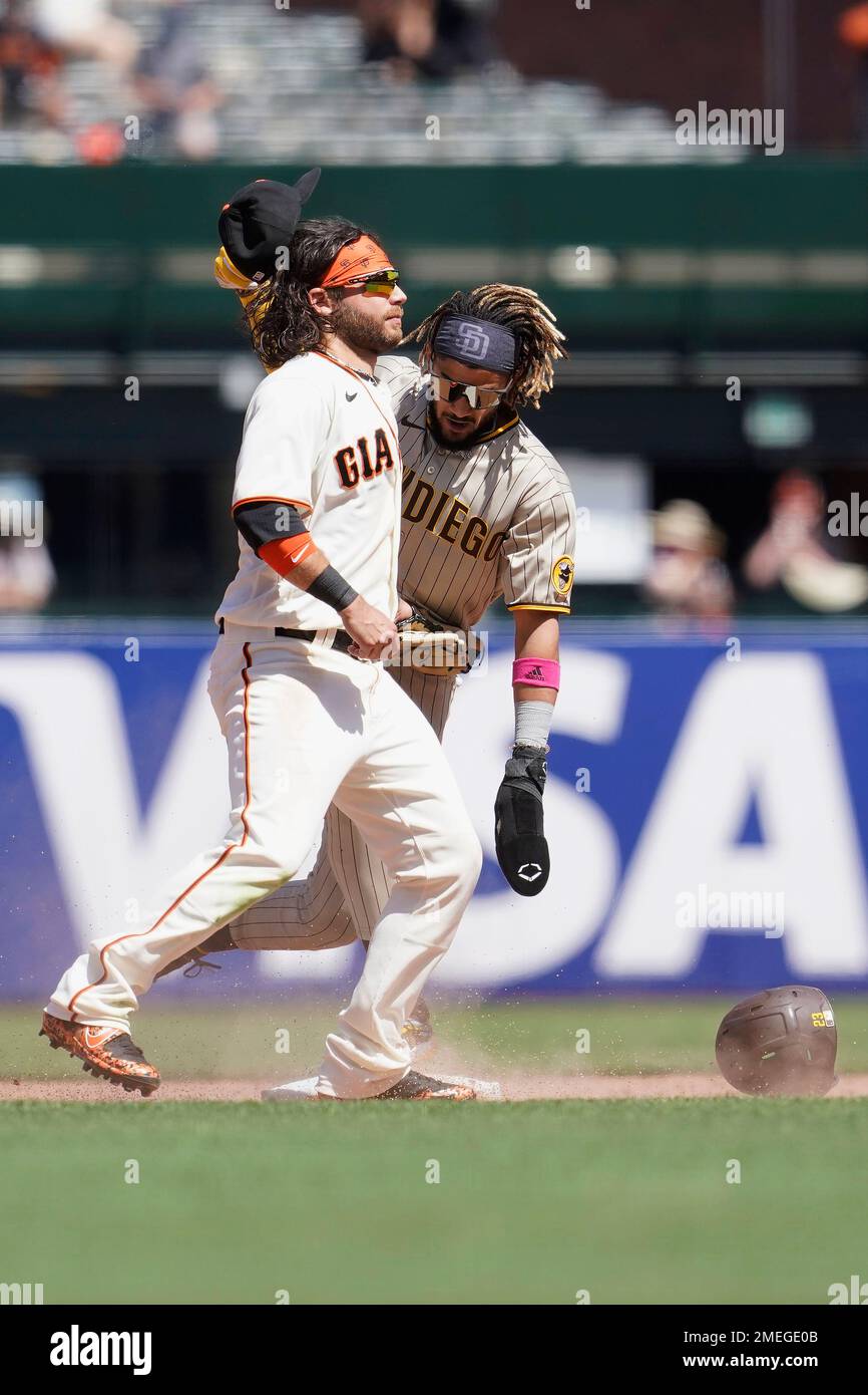 San Francisco Giants shortstop Brandon Crawford, left, and San Diego ...