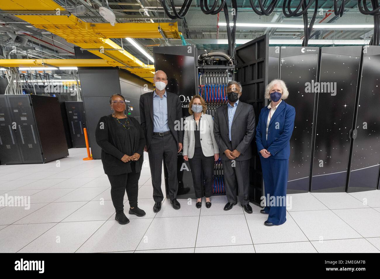 Deputy Secretary of Defense Kathleen Hicks (center) poses with, from ...