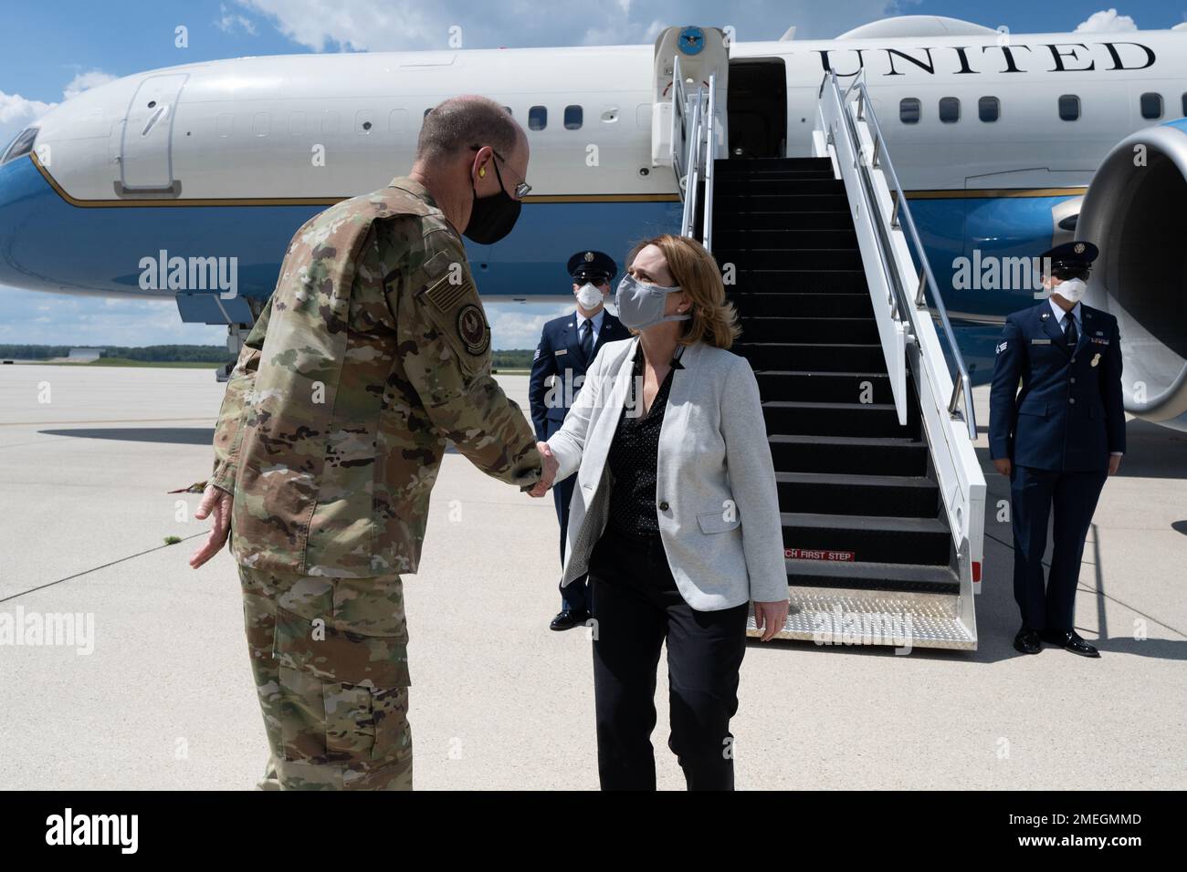 Deputy Secretary of Defense Kathleen Hicks greets the commander of Air ...
