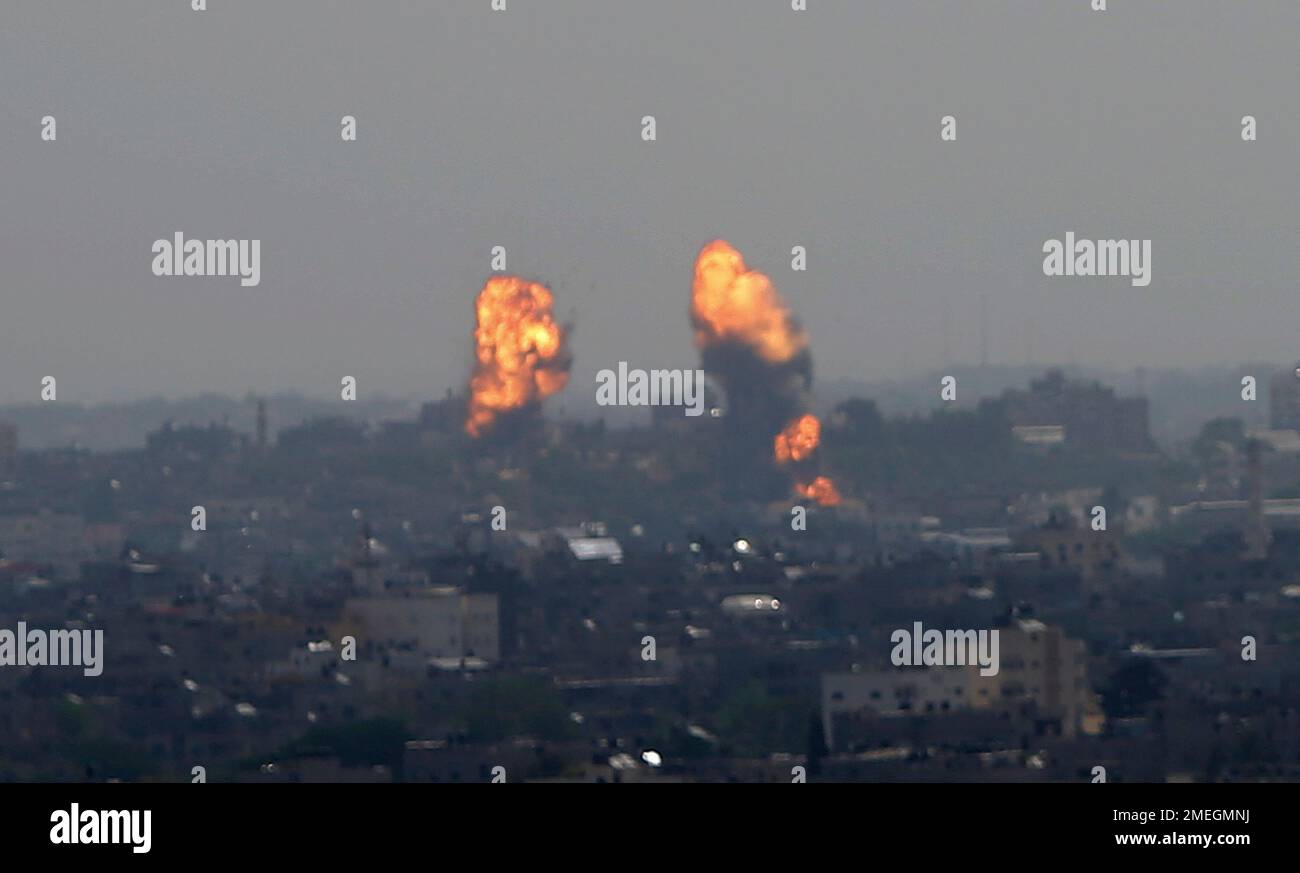 Flares rise after an Israeli forces strike in Gaza City, Tuesday, May ...