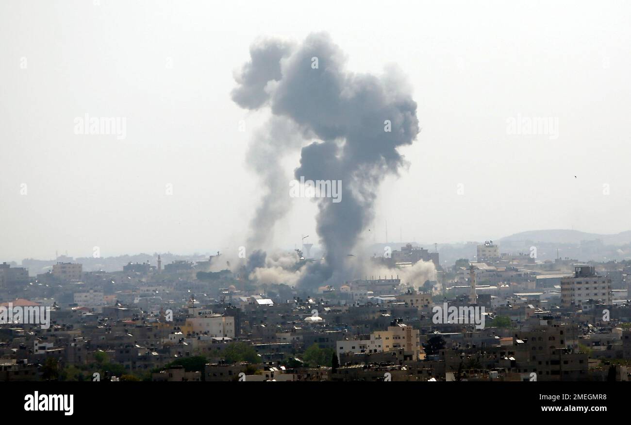 Smoke rises after an Israeli forces strike in Gaza, Tuesday, May 11 ...