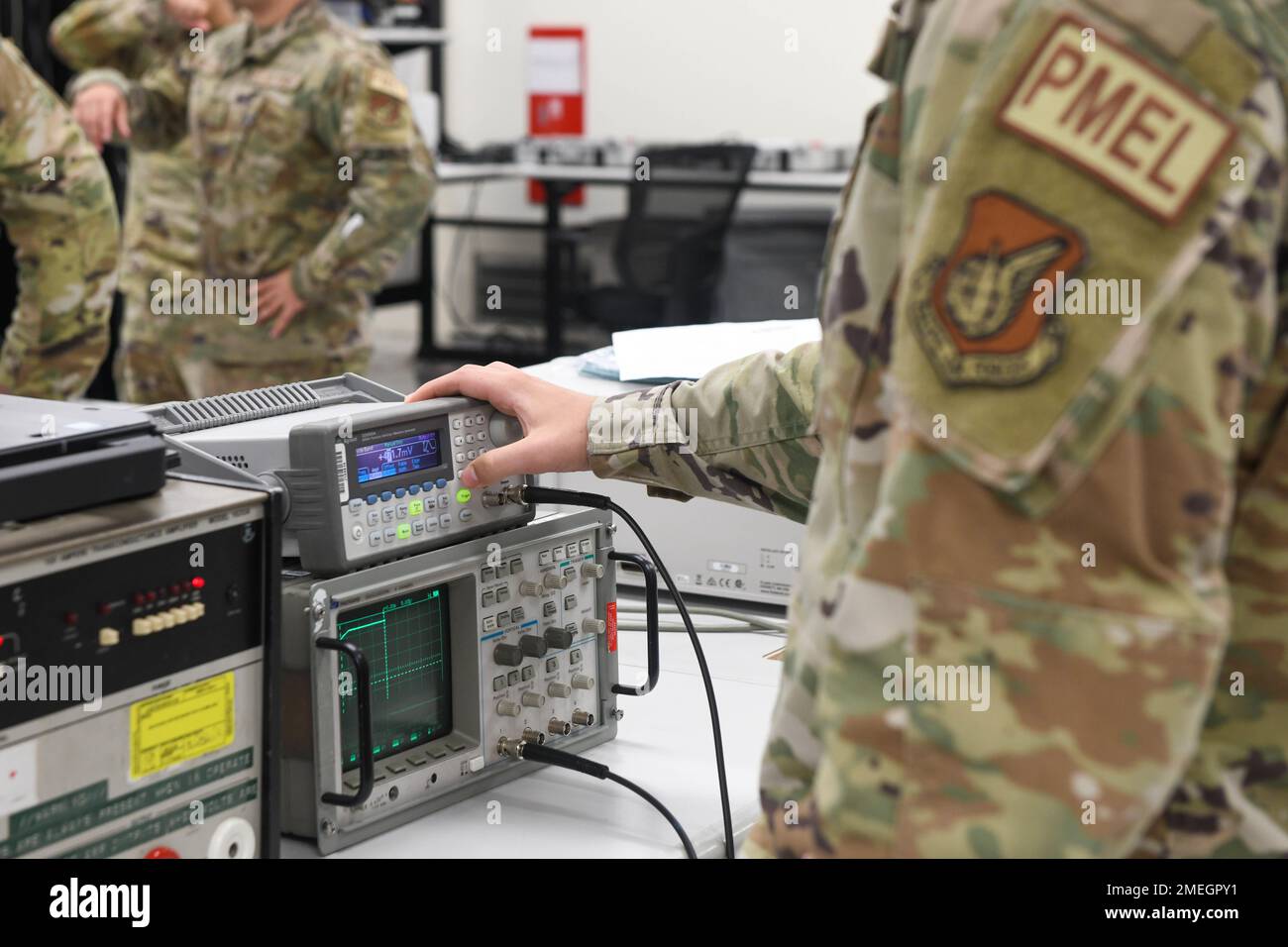 Airman 1st Class Jesus Denogean, a precision measurement equipment ...