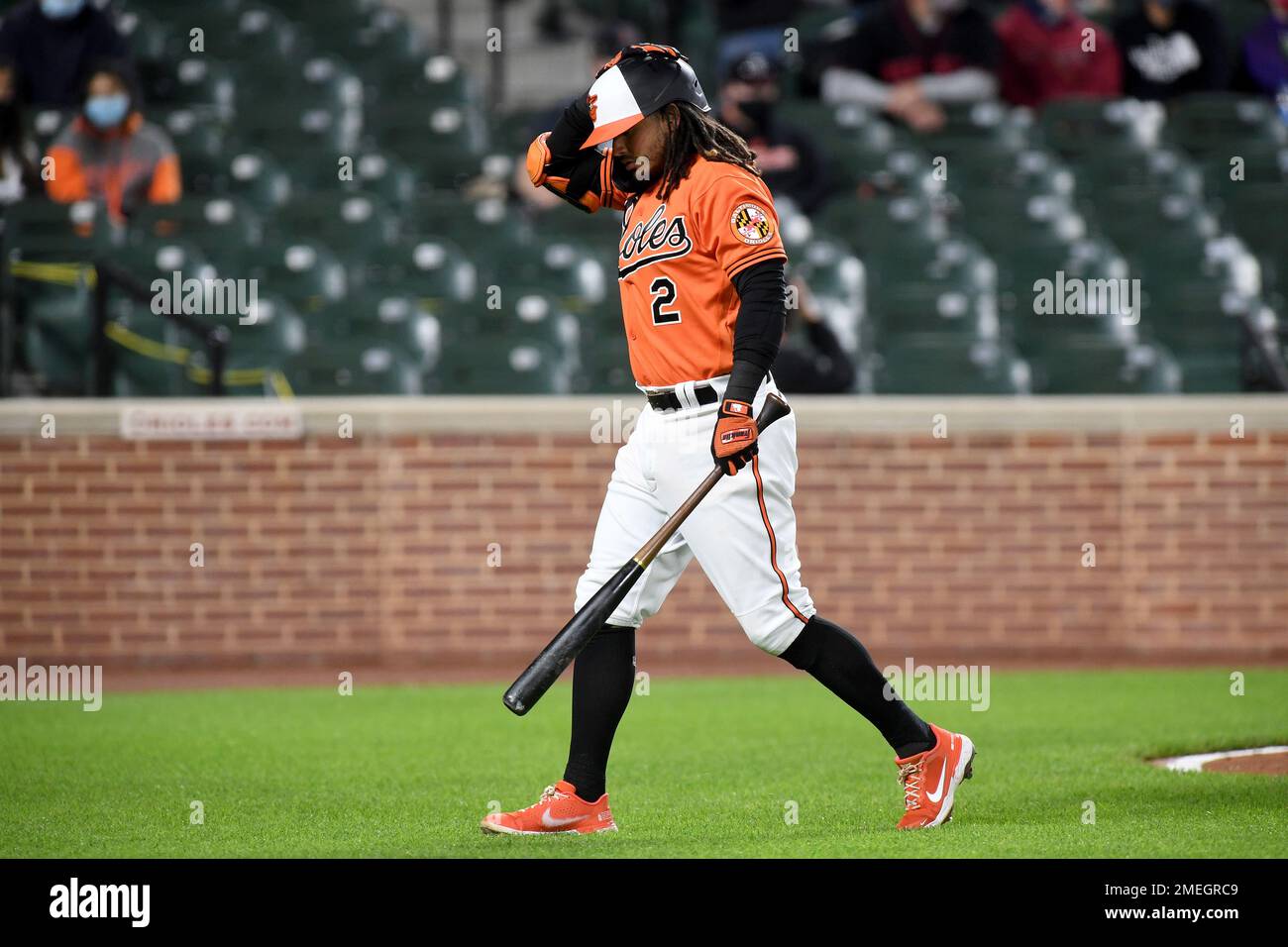 Baltimore Orioles' Freddy Galvis walks off the field after an at-bat ...