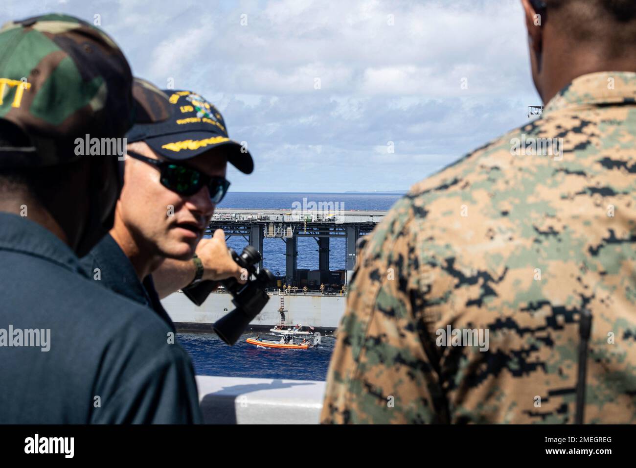 U.S. Navy Capt. Douglas Graber, center, USS New Orleans (LPD 18 ...