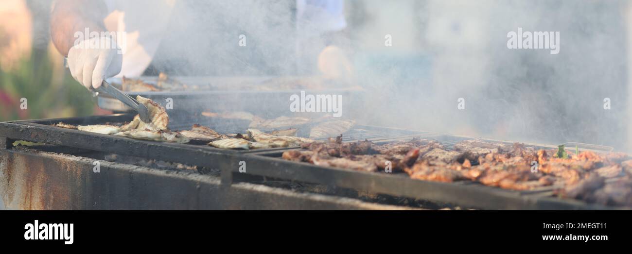 Cook prepares fresh fish hi-res stock photography and images - Alamy
