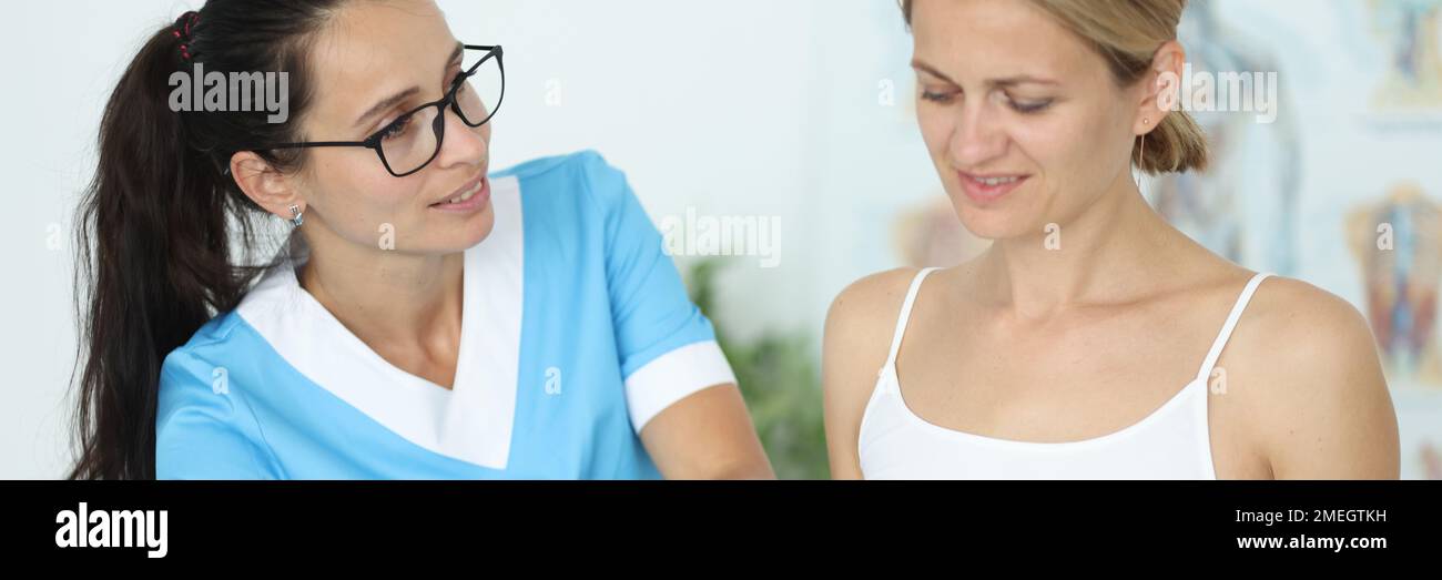 Female patient receiving medical care in rehabilitation center after ...