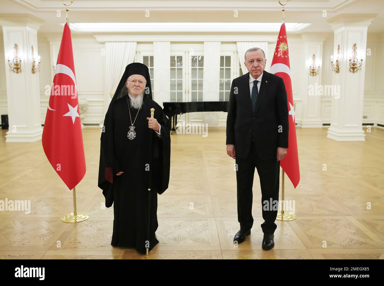 Turkey's President Recep Tayyip Erdogan, right, poses for photographs ...