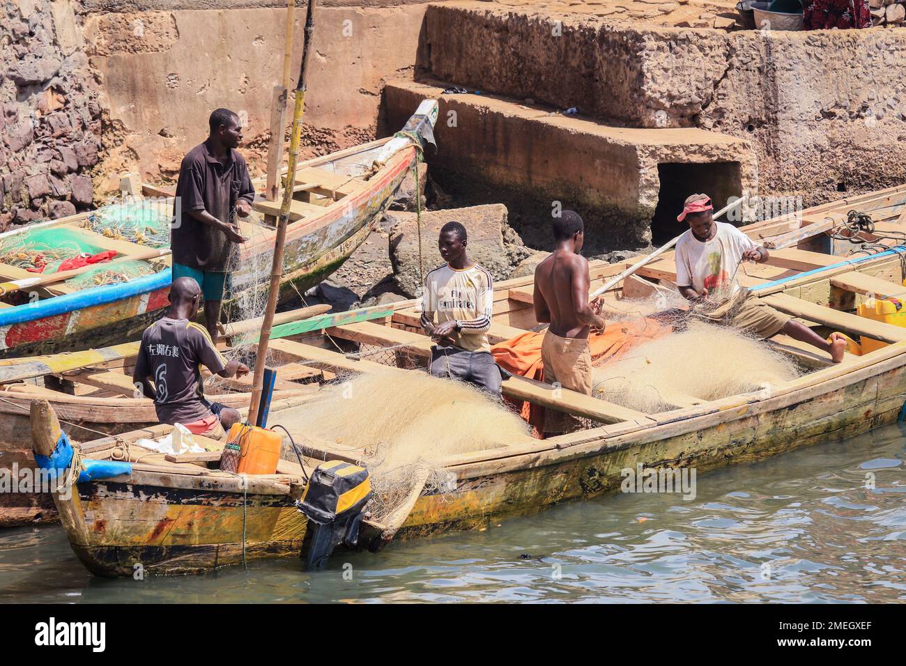 Atlantic Ocean View in the Elmina port with the Fishermen in the Boats ...