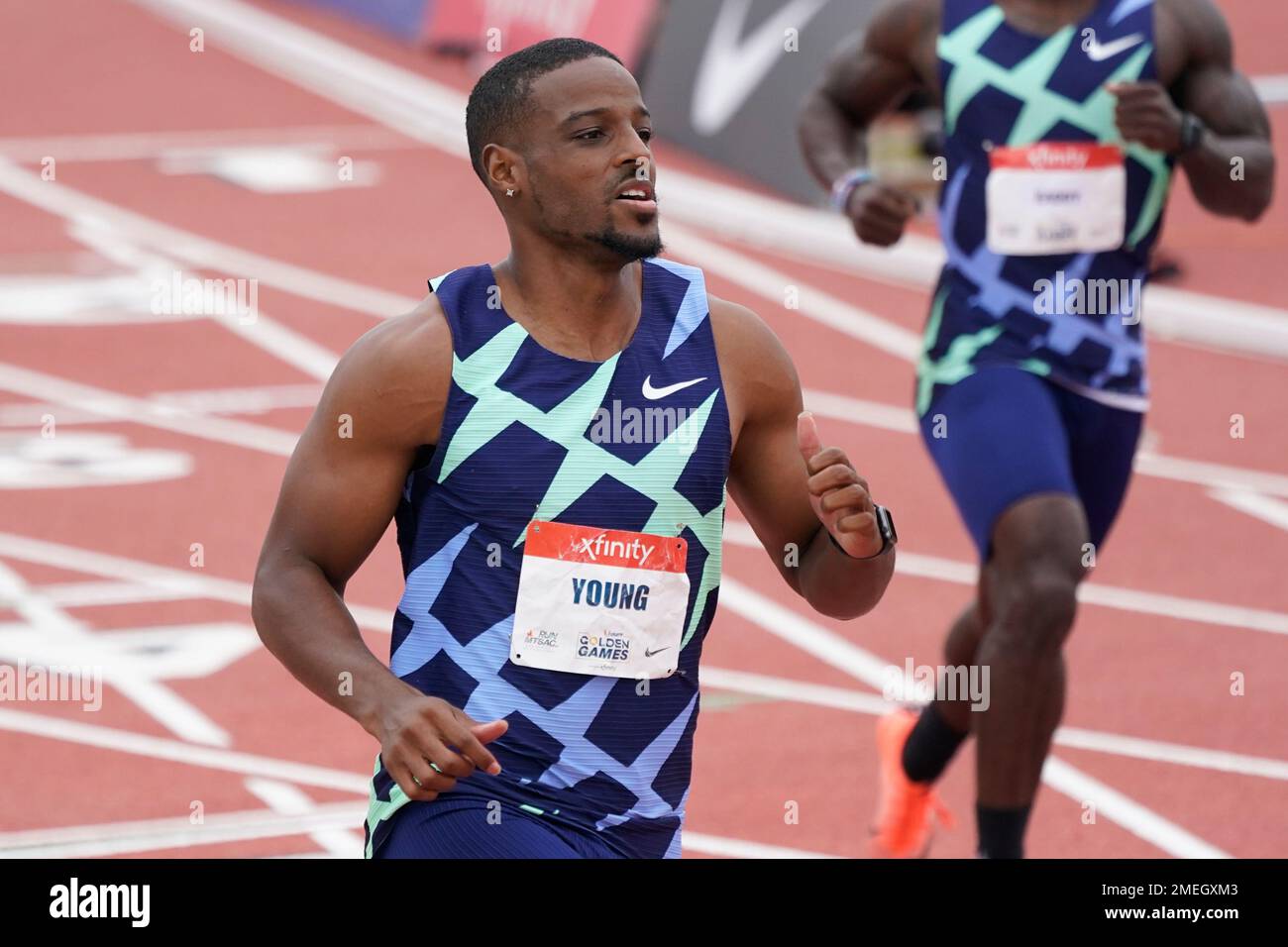 Isiah Young wins the first heat of the men's 100-meter dash prelim ...