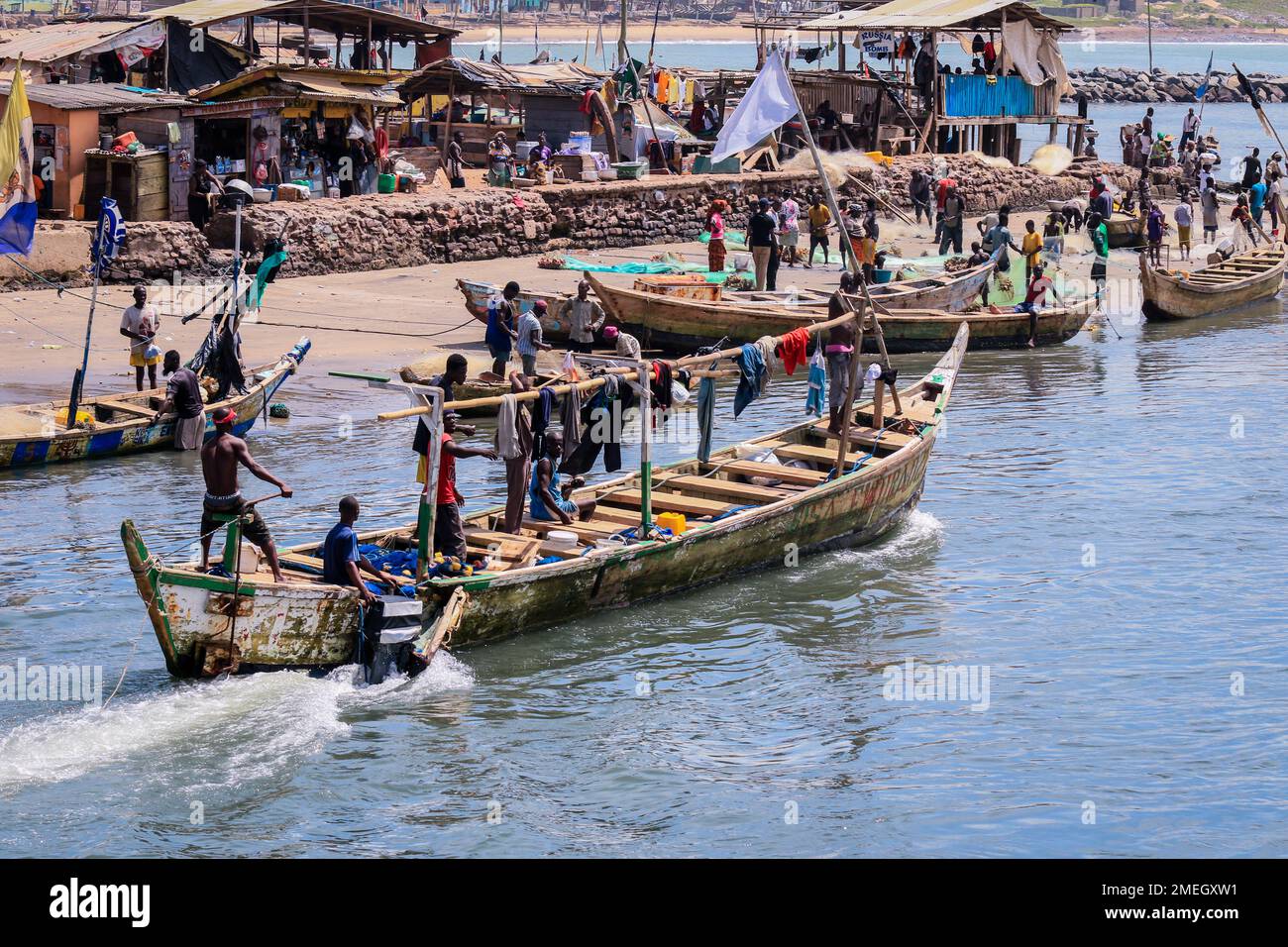 Atlantic Ocean View in the Elmina port with the Fishermen in the Boats ...