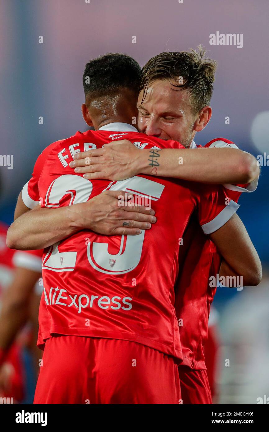 Sevilla's Fernando, left, celebrates after scoring the opening goal ...