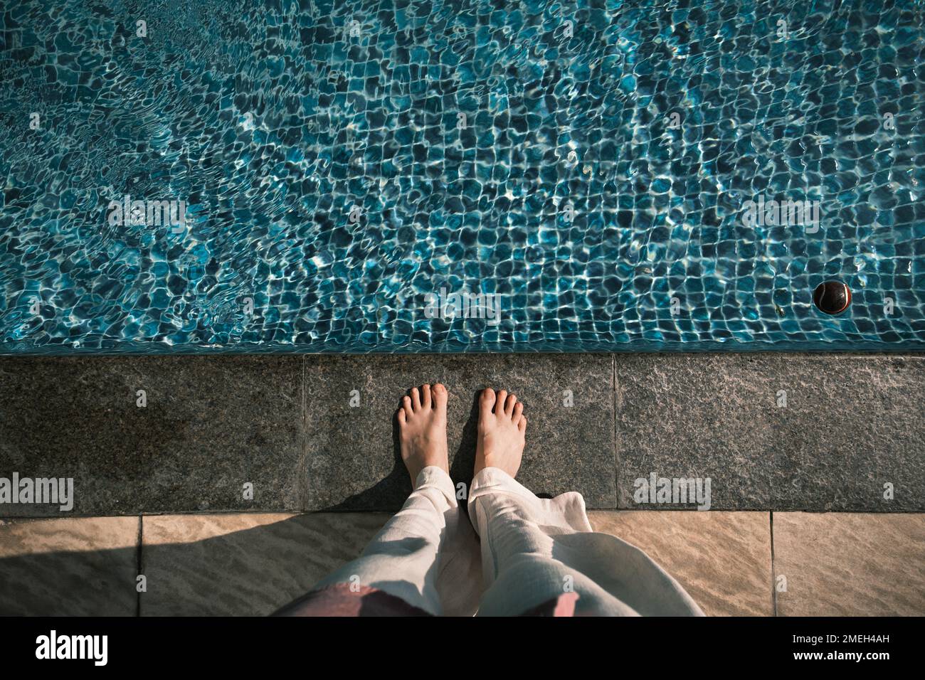Person on the swimming pool Stock Photo - Alamy