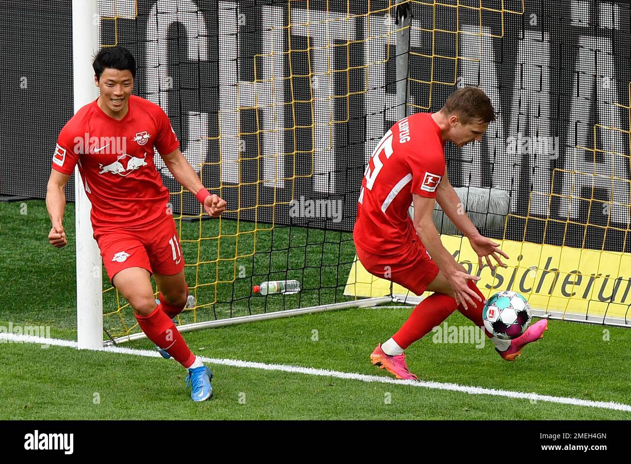 Leipzig's Daniel Olmo, right, scores his side's second goal during the ...