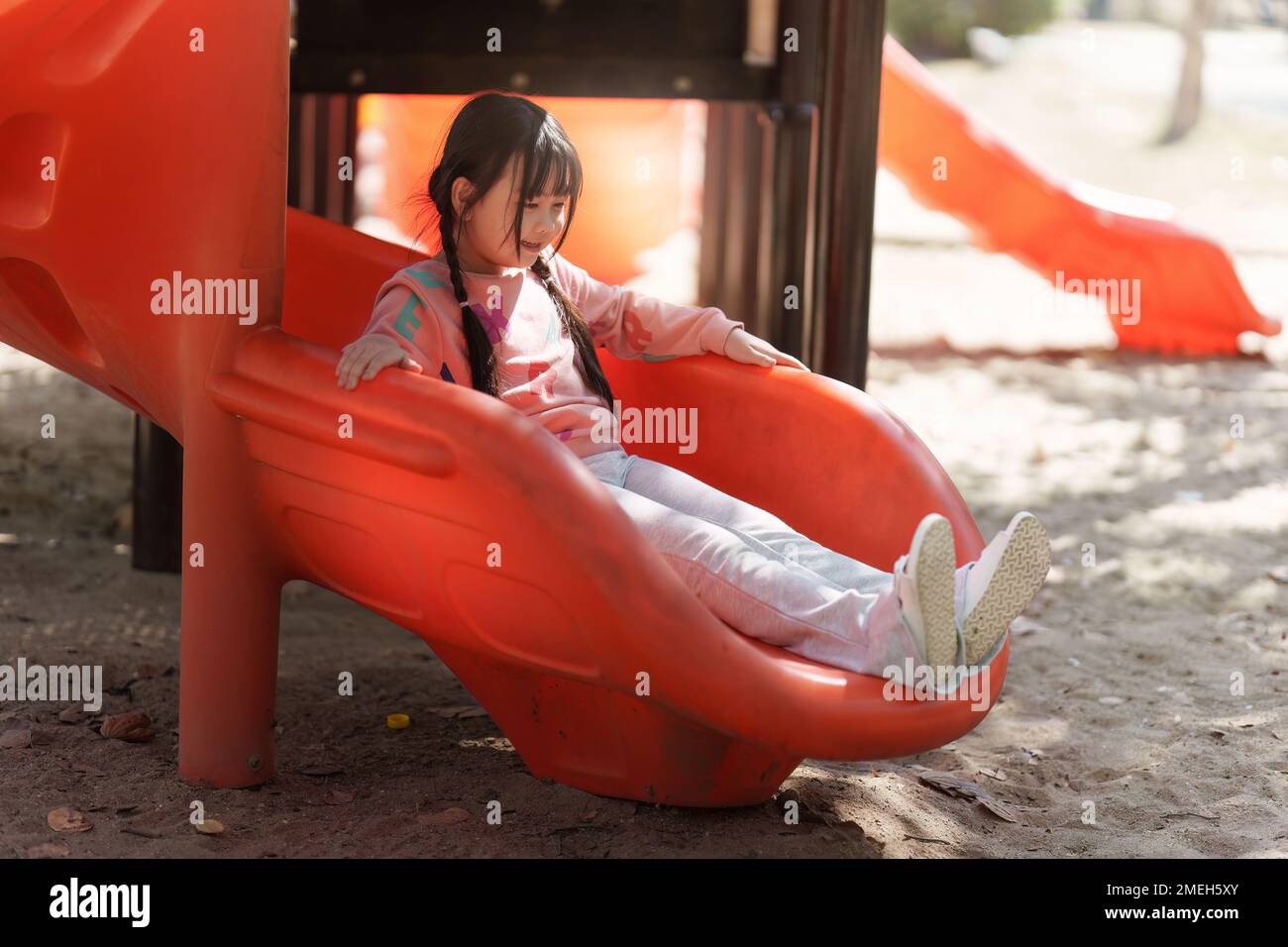Happy Asian children playing at playground at outdoor park Stock Photo ...