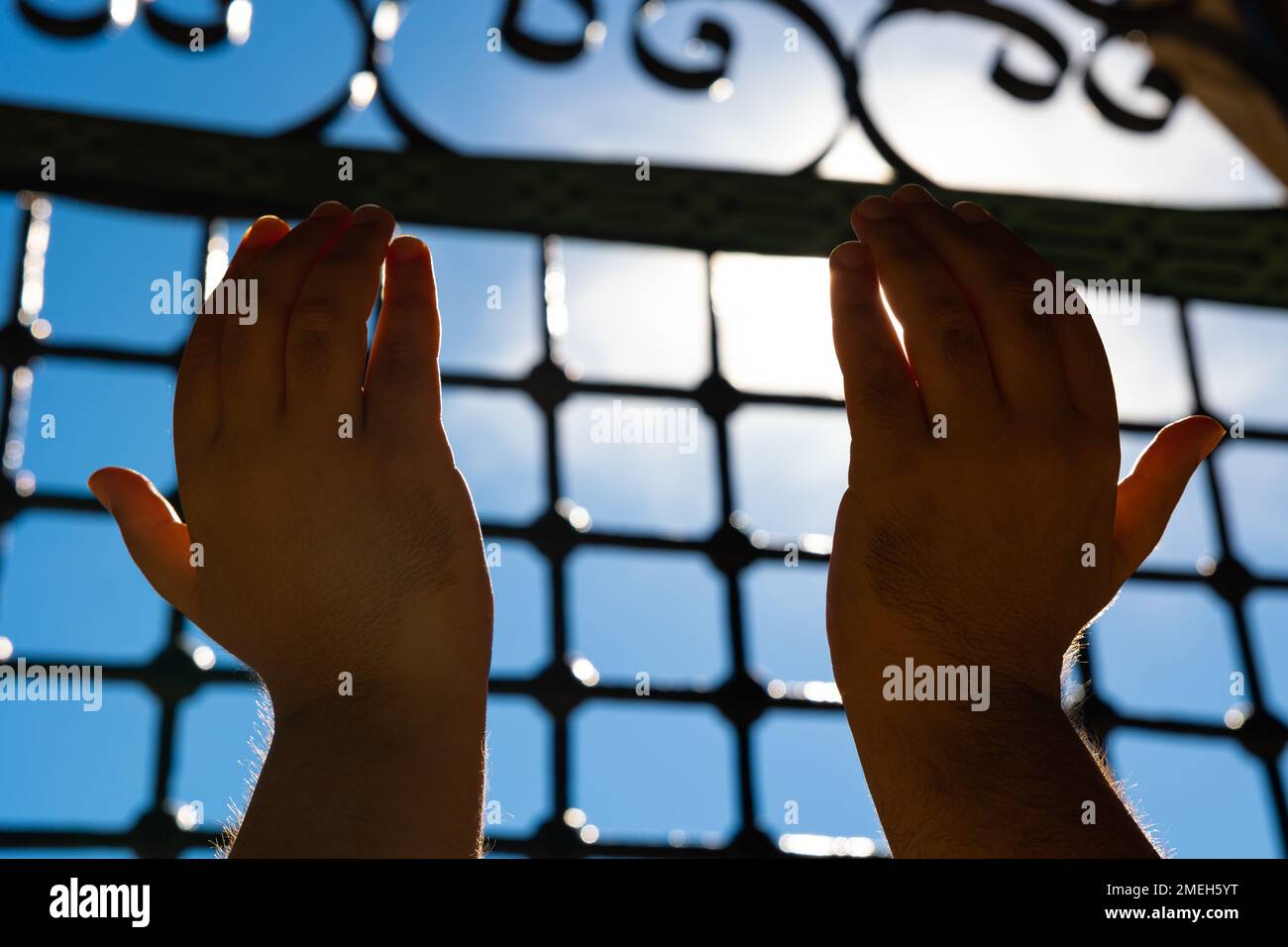 Islamic photo. Muslim man praying with raising his hands. Ramadan ...