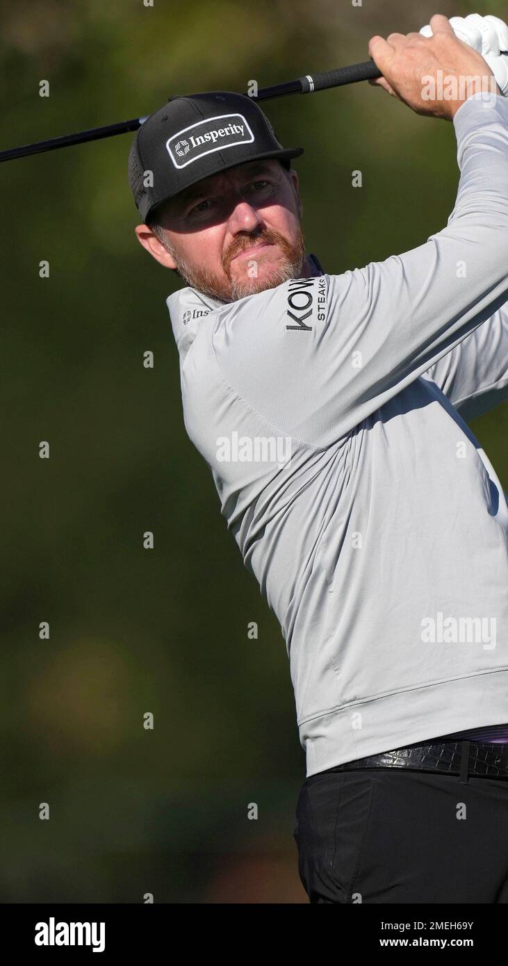 Jimmy Walker hits a tee shot during the American Express golf ...