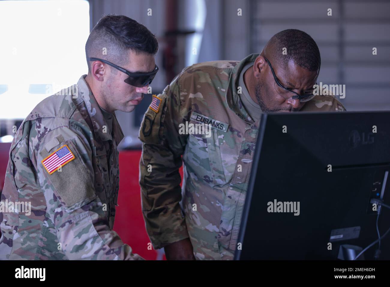 U.S. Army Reserve Spc. Dakota Beal and Sgt. Herman Eubanks, wheeled ...