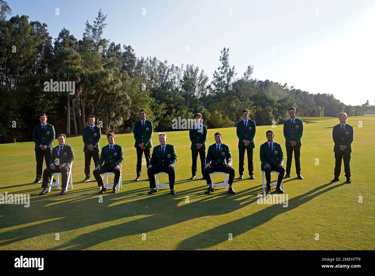 U.S. players pose socially distanced for a team photo during opening ...