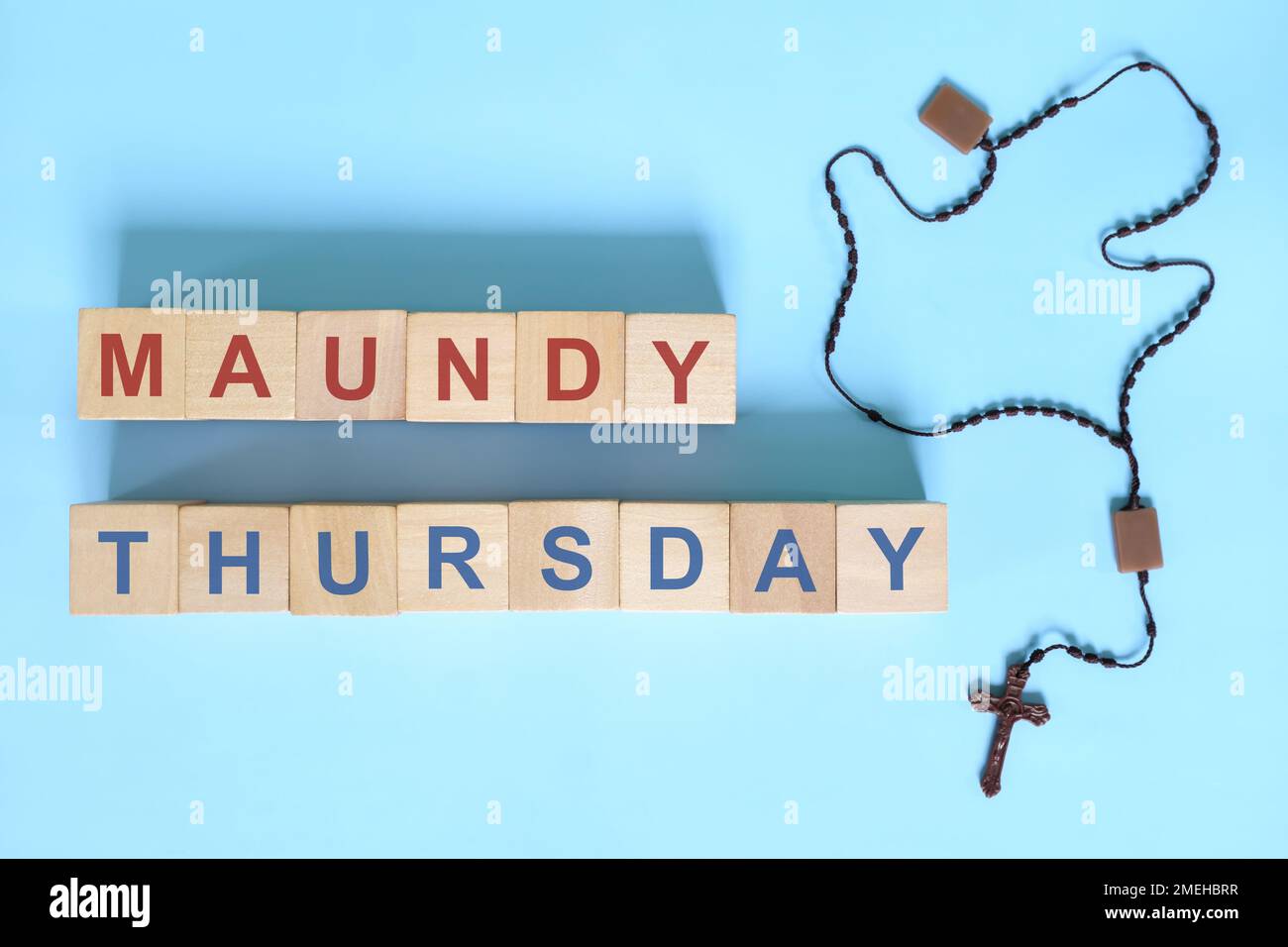 Maundy Thursday holy week concept. Wooden blocks typography with rosary ...