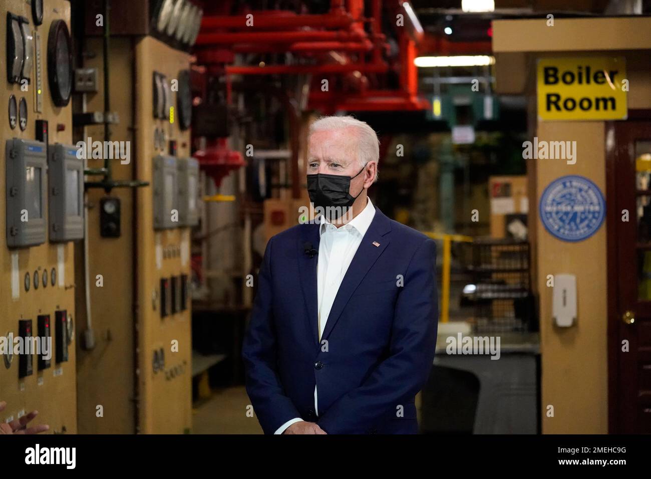 President Joe Biden listens as he tours the Sewerage & Water Board's ...