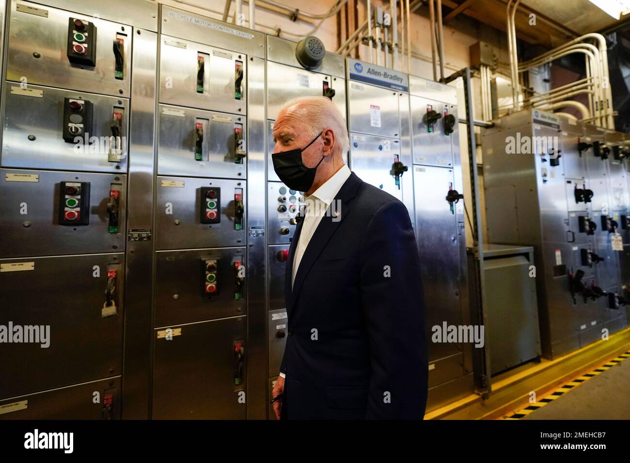 President Joe Biden walks as he tours the Sewerage & Water Board's ...