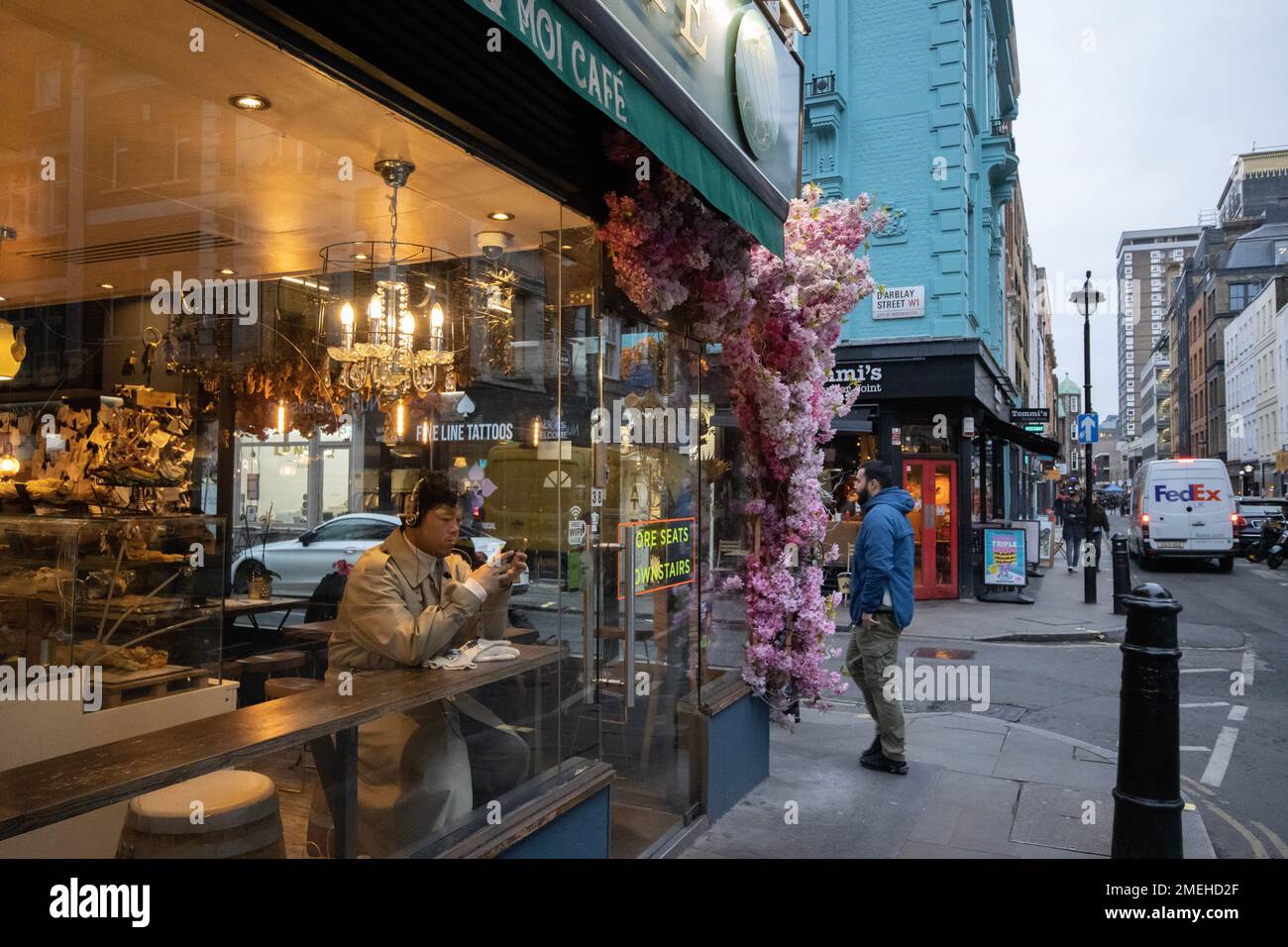 Man sits in window of TOI & MOI CAFE, Berwick Street, Soho, West End ...