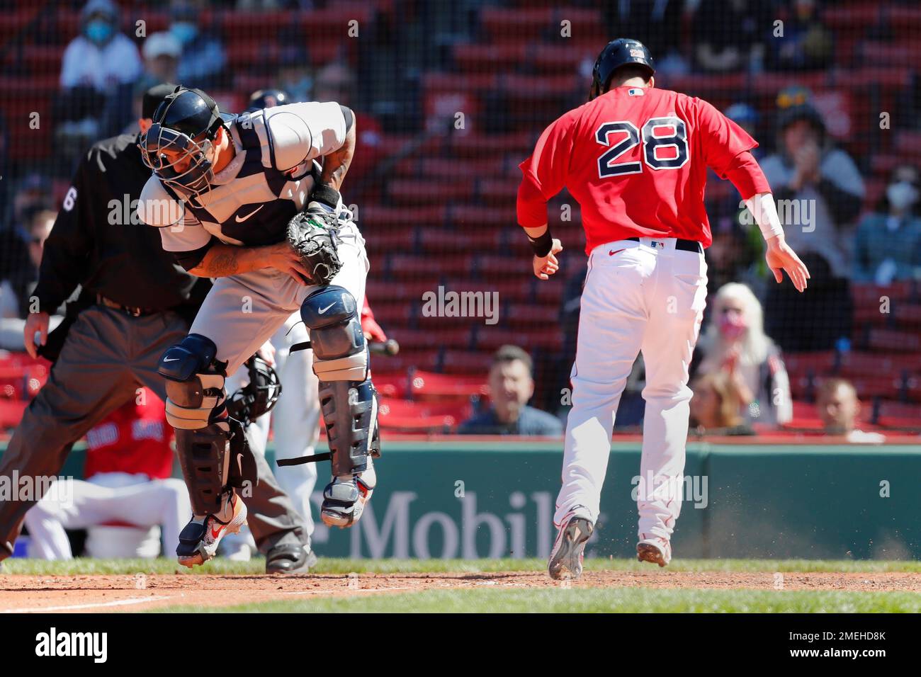 Detroit Tigers' Niko Goodrum (28) scores on a single by Xander Bogaerts ...