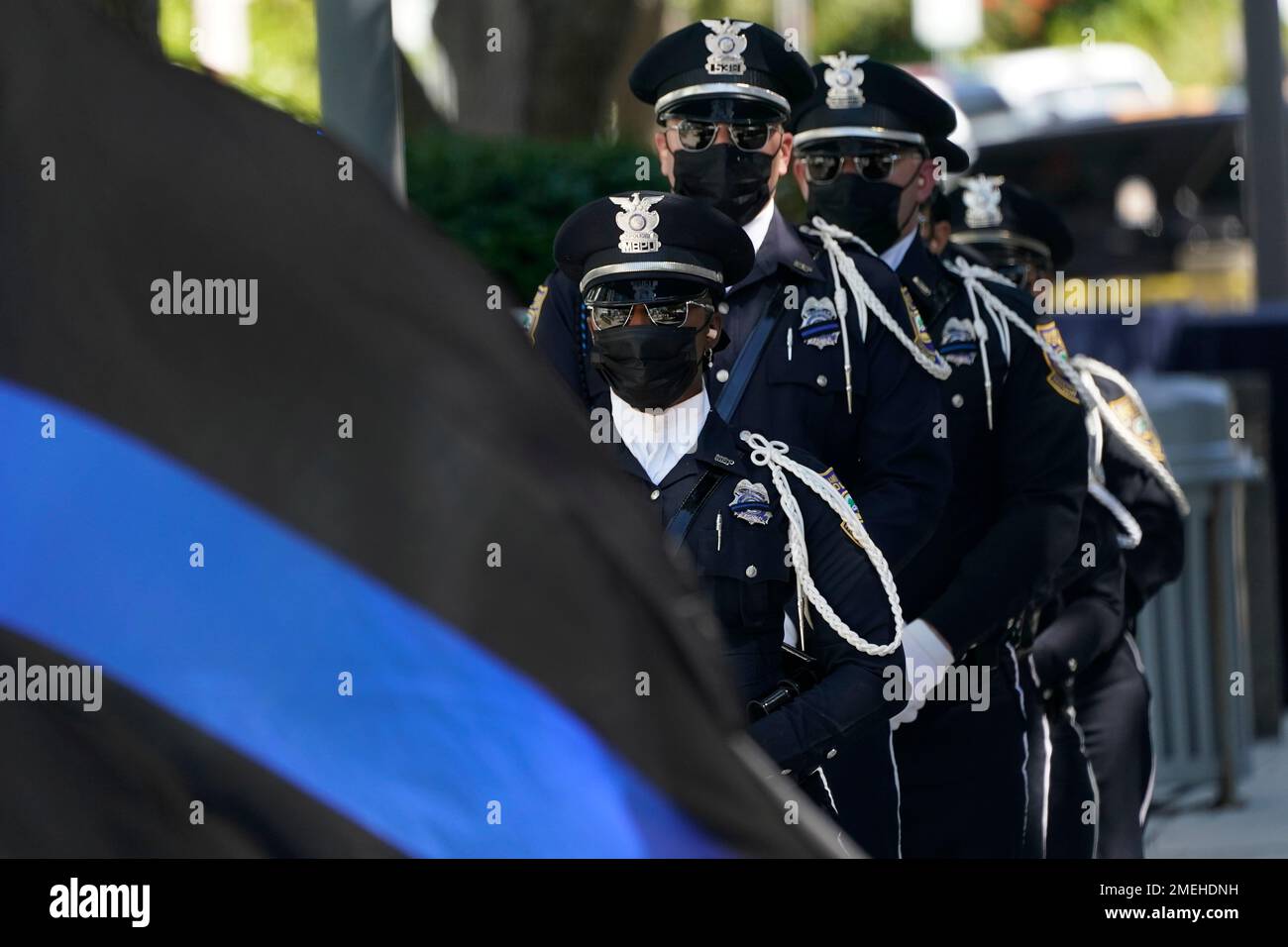 A Miami Beach Police Color Guard stands near a law enforcement memorial ...