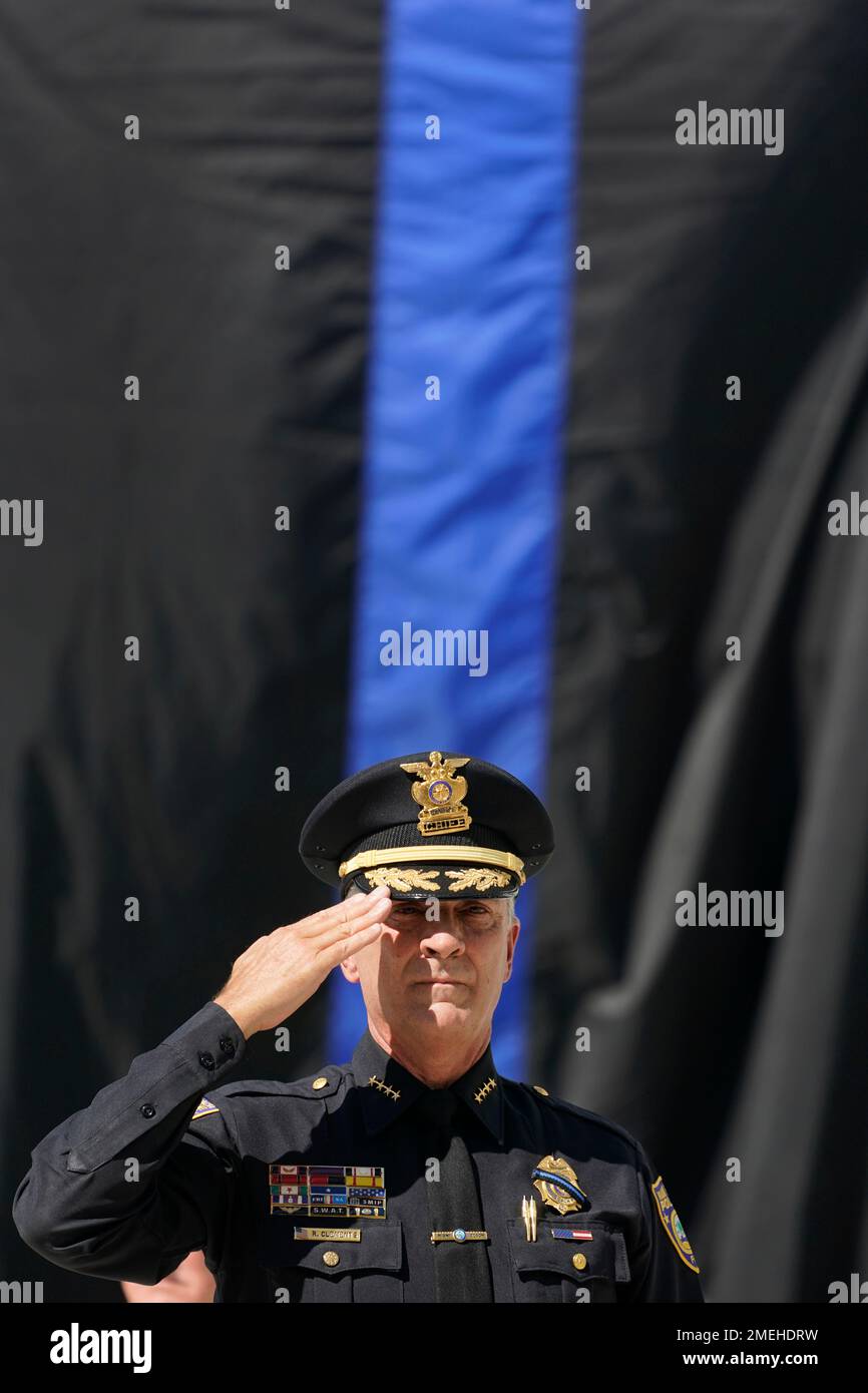 Miami Beach Police Chief Richard Clements salutes during a ceremony to ...