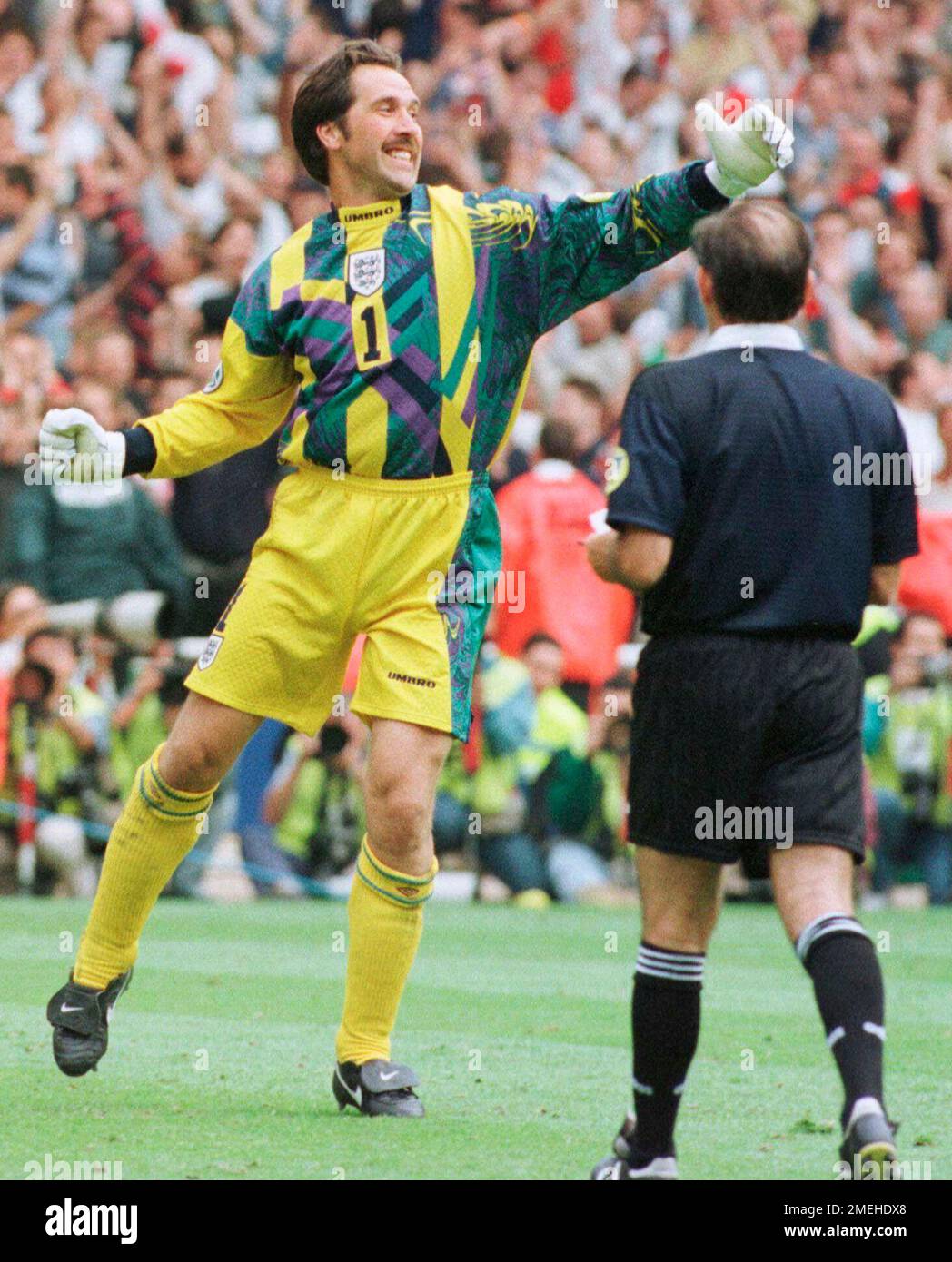 England's goalkeeper David Seaman celebrates his winning save during ...