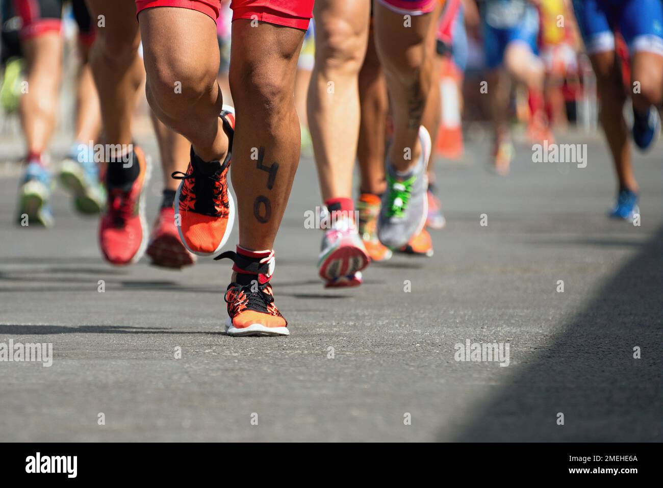 Marathon competition during an ironman the numbers on the leg Stock ...