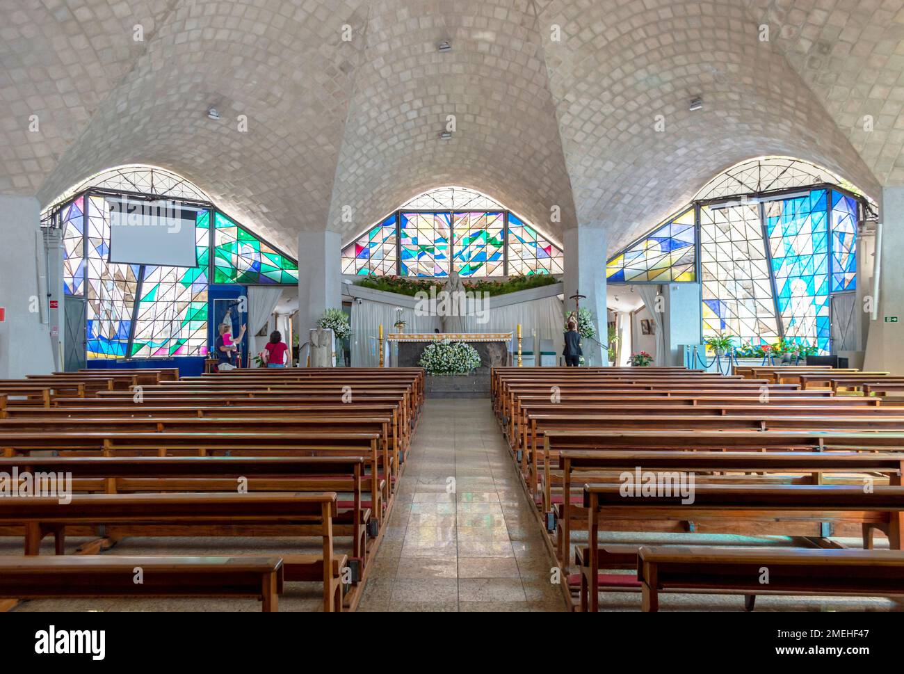 Altar. stained glass Image. Interior of the parish of Our Lady of ...