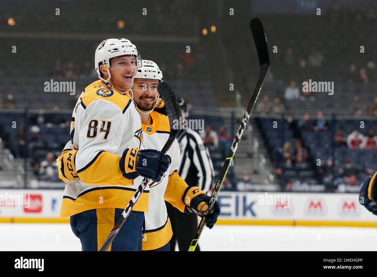 Nashville Predators' Tanner Jeannot, left, celebrates his goal against ...