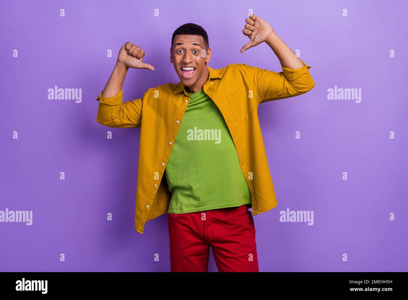 Photo of funky funny guy dressed yellow shirt pointing thumbs himself ...