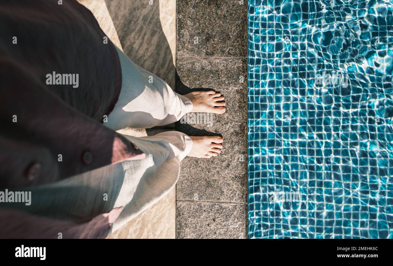 Person on the swimming pool Stock Photo - Alamy