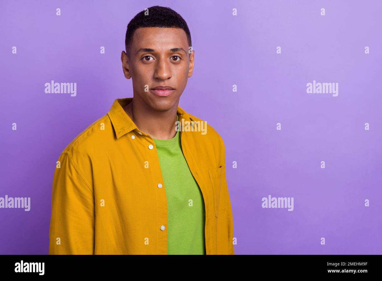 Photo of serious good mood handsome satisfied guy dressed yellow shirt ...