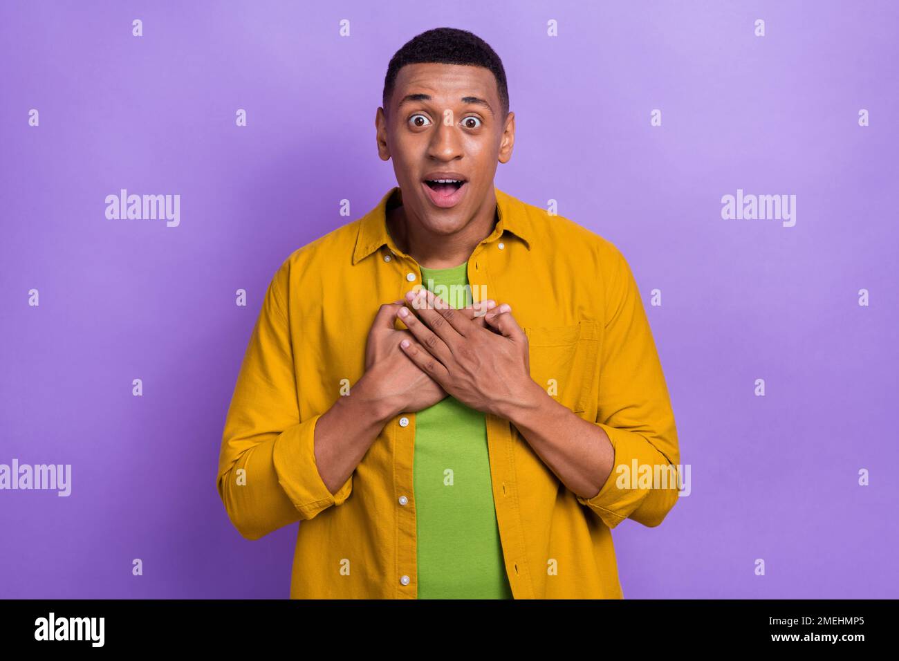 Photo of impressed positive man arms touch chest cant believe ...