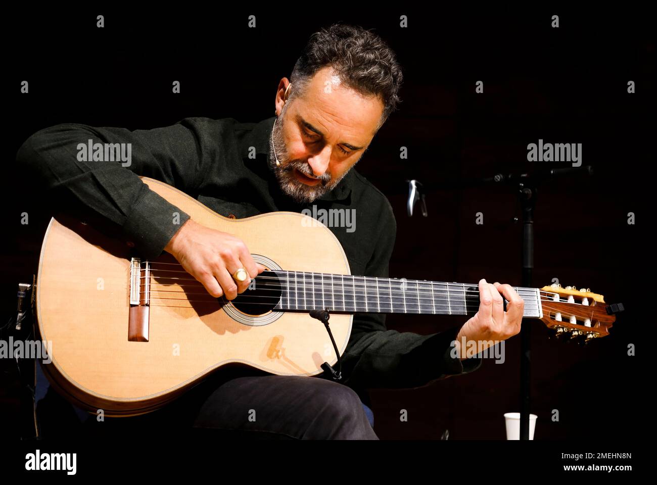 Portrait of Spanish musician and composer Jorge Drexler playing the ...