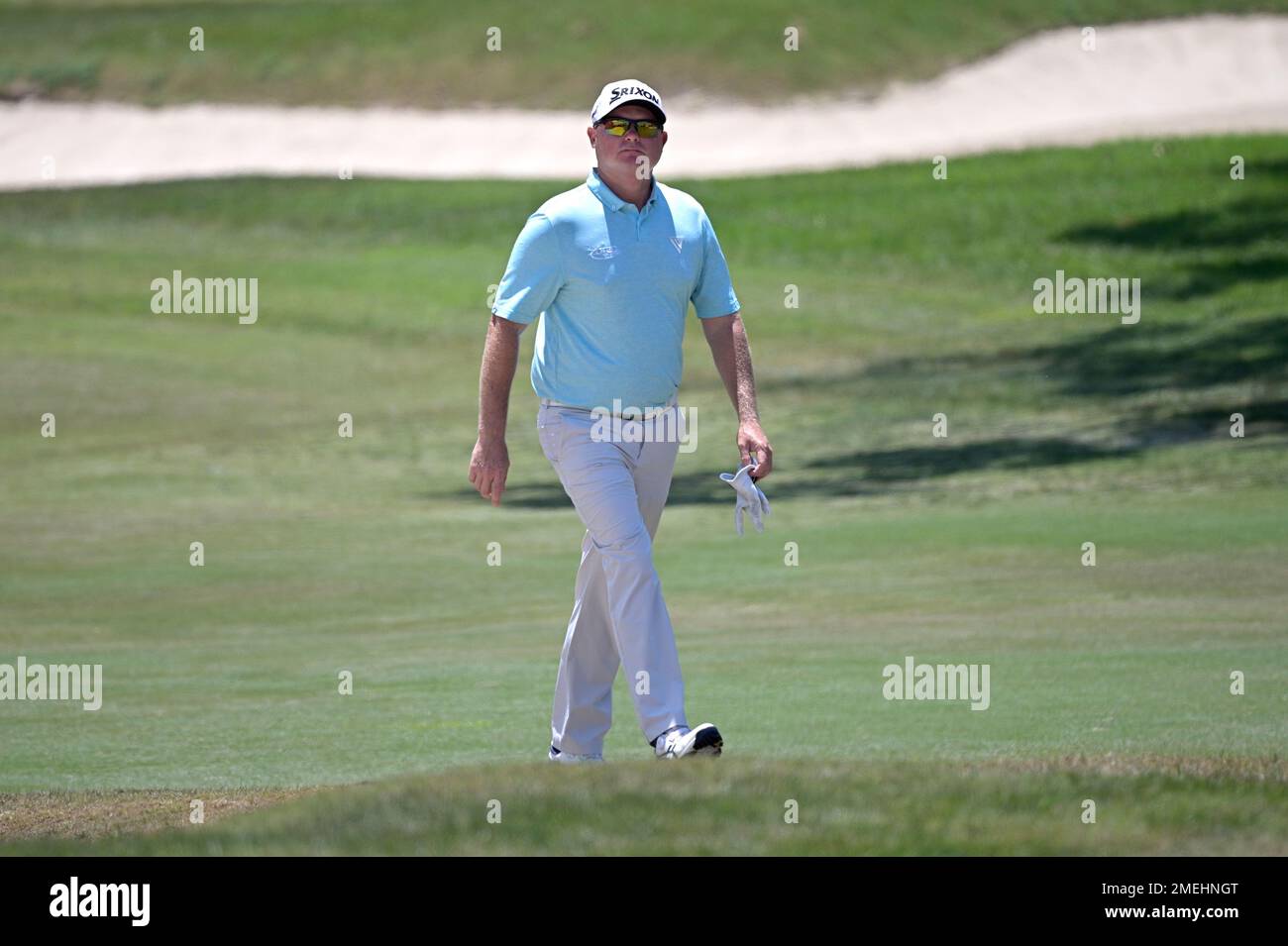 Ted Potter, Jr. walks to the first green during the final round of the ...