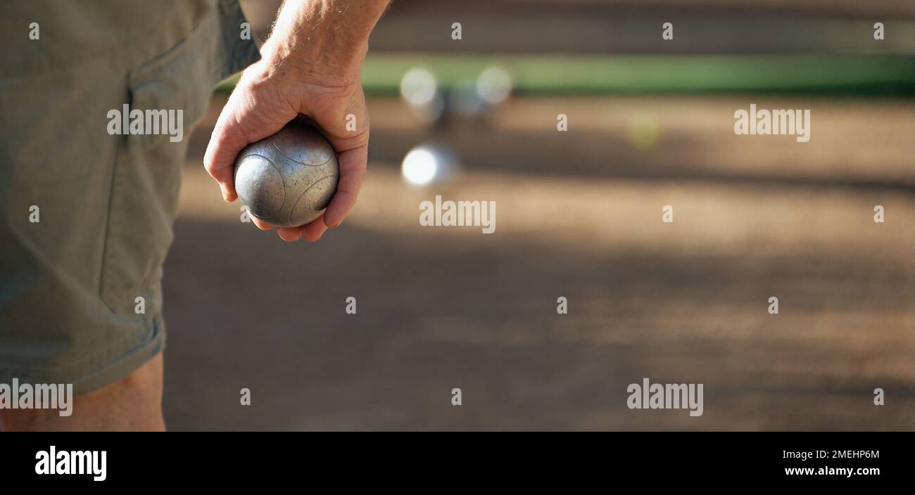 Senior playing petanque fun and relaxing game Stock Photo - Alamy